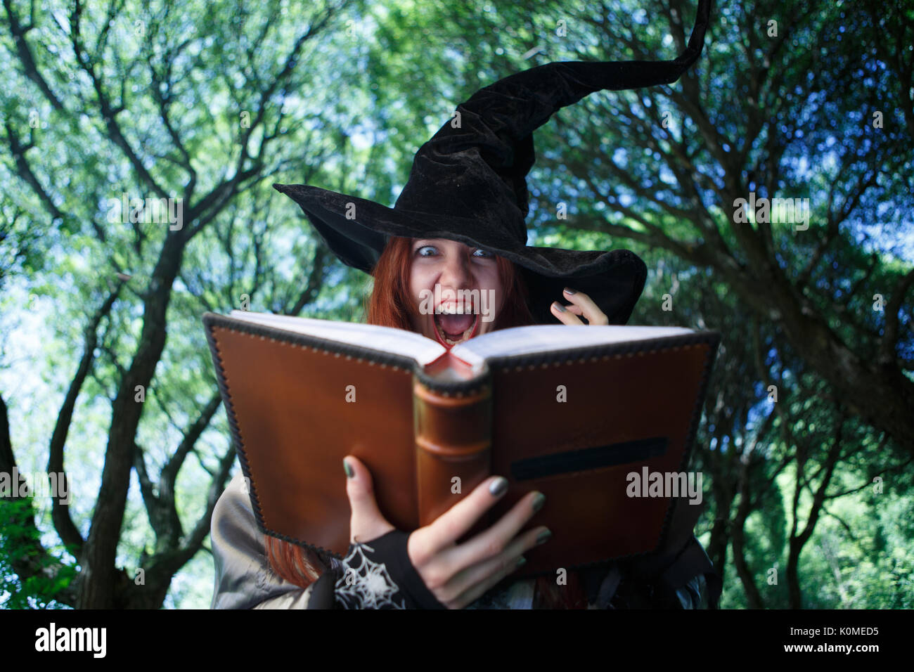 Picture of witch casting spell Stock Photo - Alamy