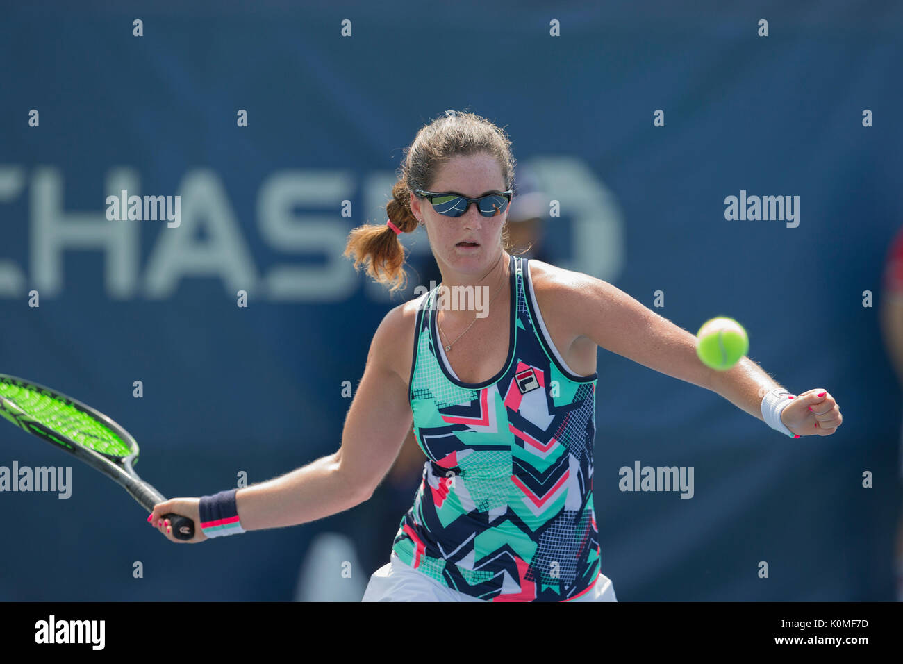 New York, United States. 22nd Aug, 2017. Jamie Loeb of USA returns ball ...