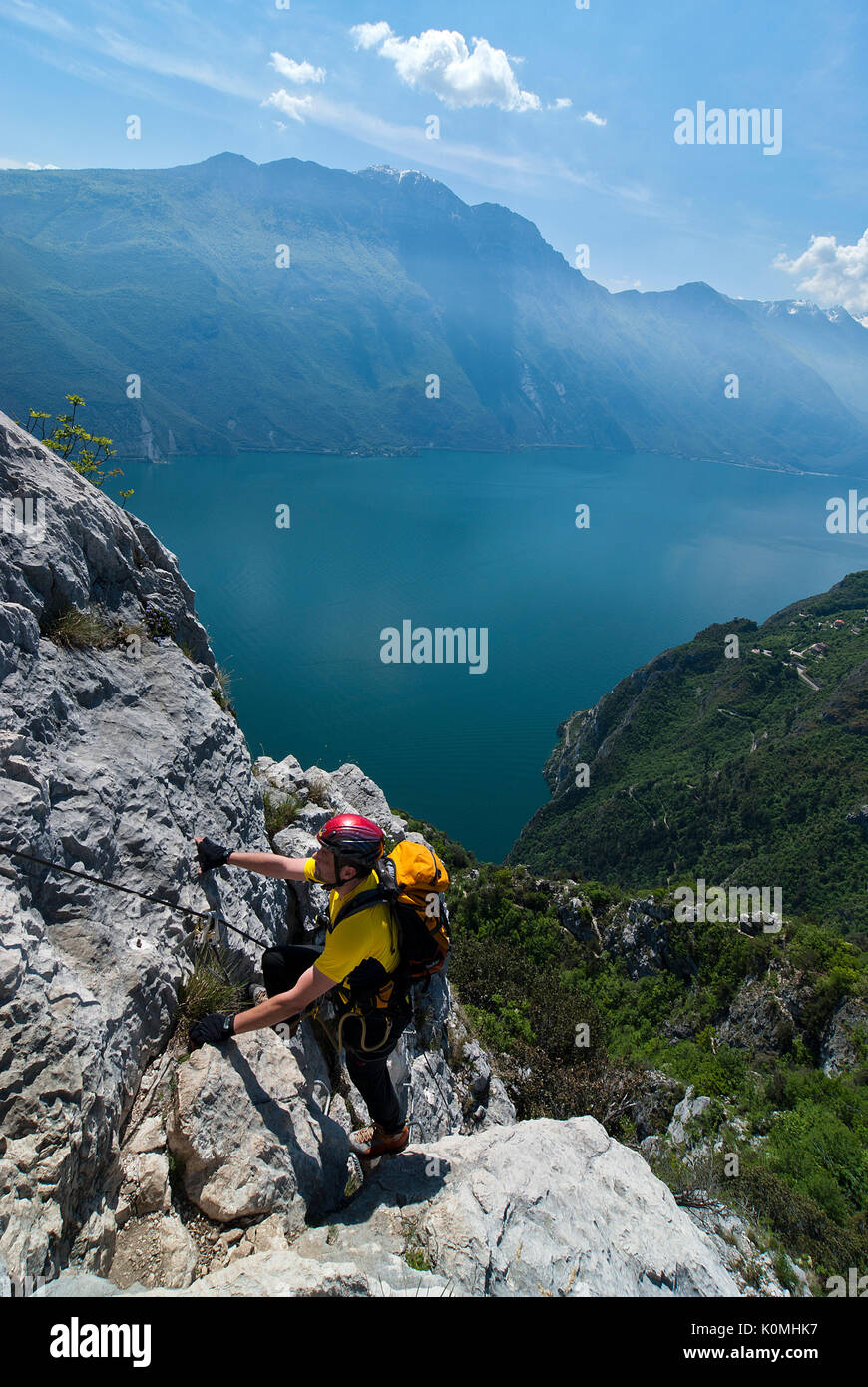 Lake Garda, Trentino, Italy. Climber on the Ferrata Susatti to the Cima ...