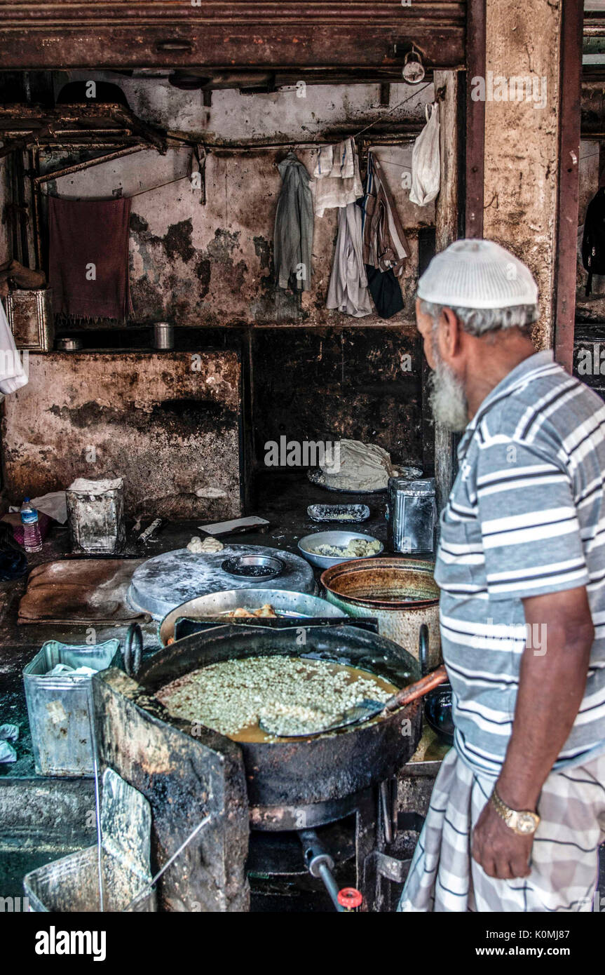 Man cooking sweet dish, Chor Bazaar, Mumbai, Maharashtra, India, Asia ...