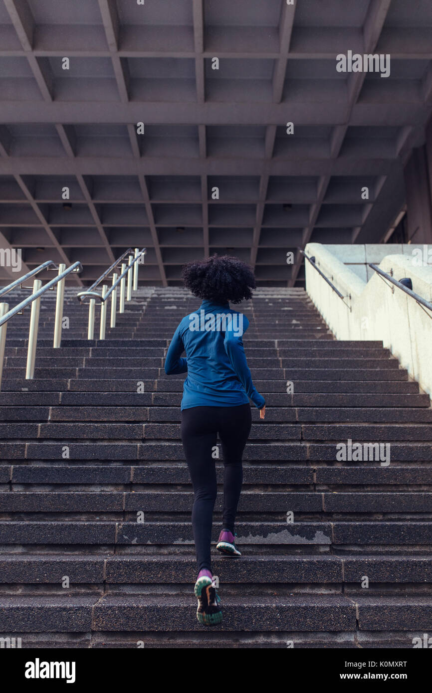 Woman climbing stairs exercise hi-res stock photography and images - Alamy