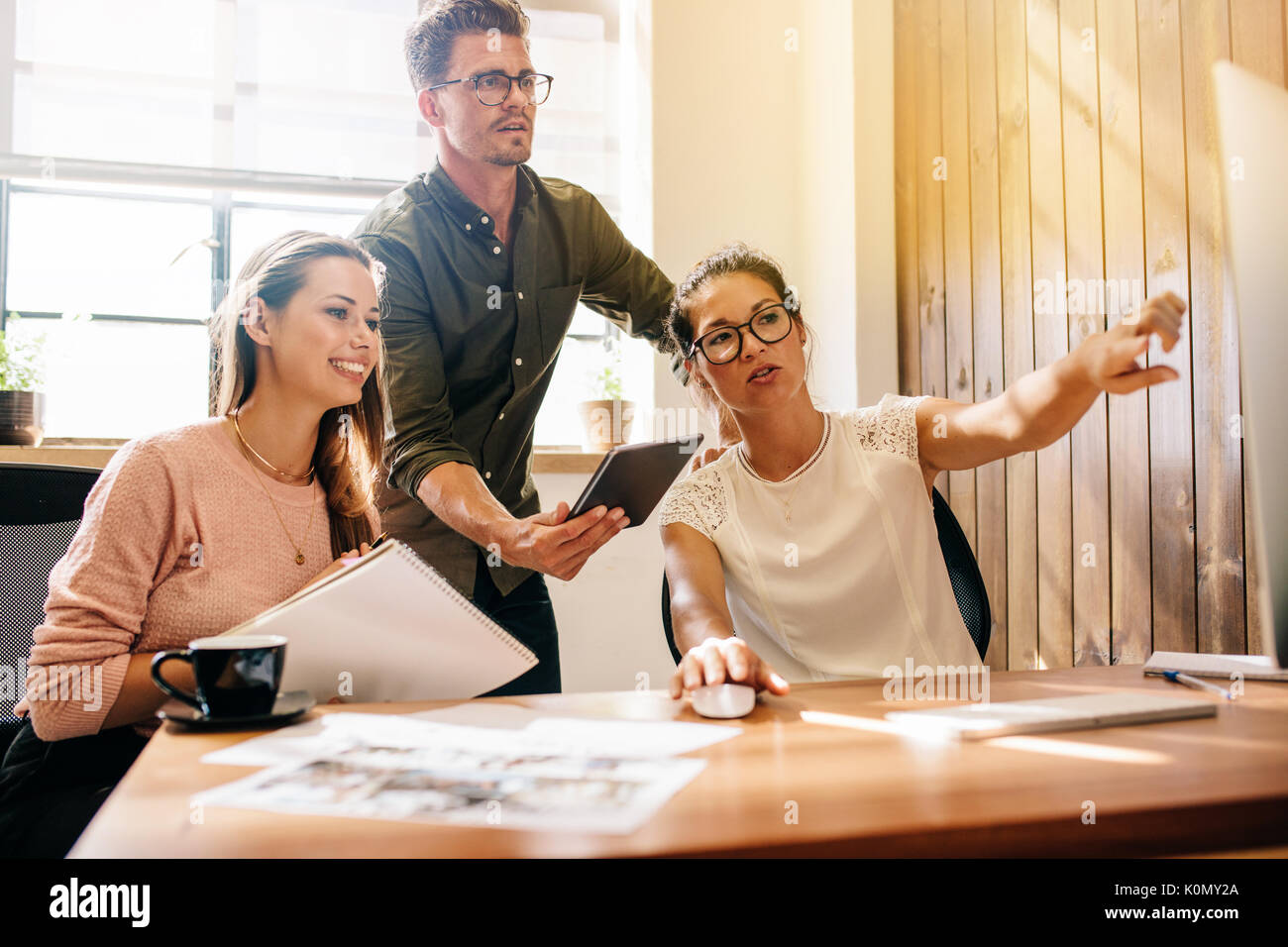 Creative business team working together hi-res stock photography and ...