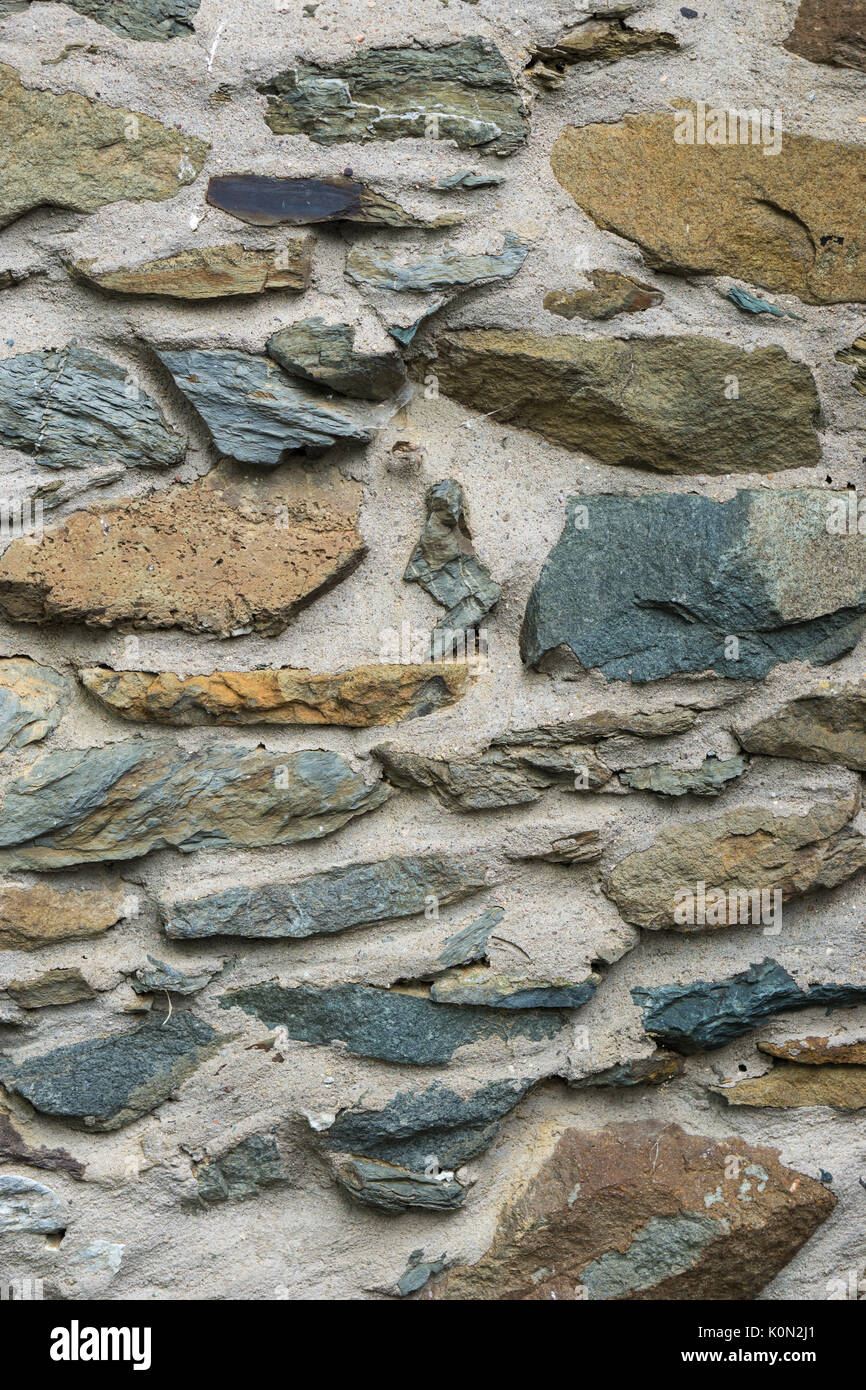 Stone wall texture with concrete Stock Photo - Alamy