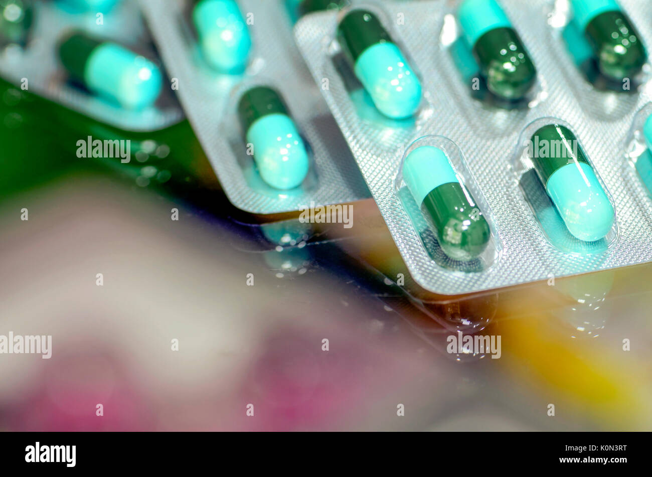 Antibiotic medication capsule strips on pharmacy counter Stock Photo ...