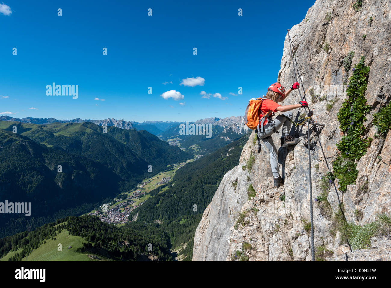 Col Rodella, Dolomites, Trentino, Italy. Climber on the via ferrata to ...
