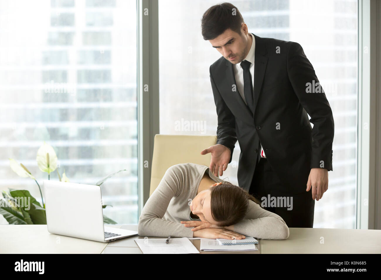 Man sleeping woman looking angry hi-res stock photography and images ...