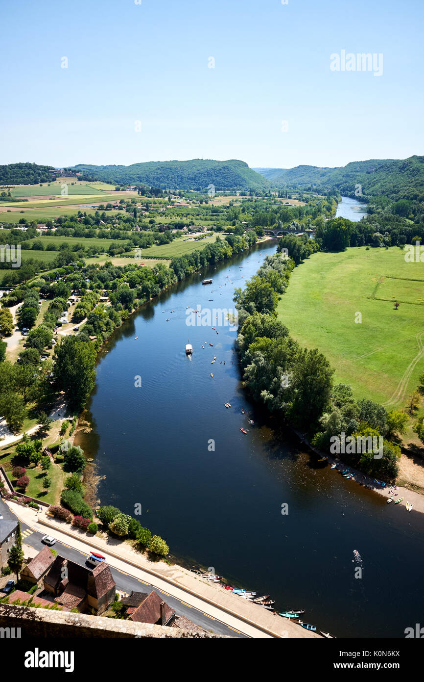 View of canoeists on the river Dordogne from the chateau of Beynac ...