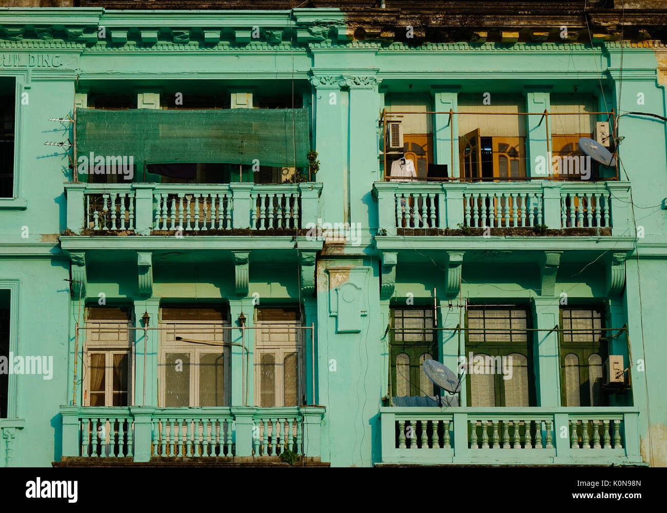 Details of an old apartment at Chinatown in Yangon, Myanmar. Yangon is ...