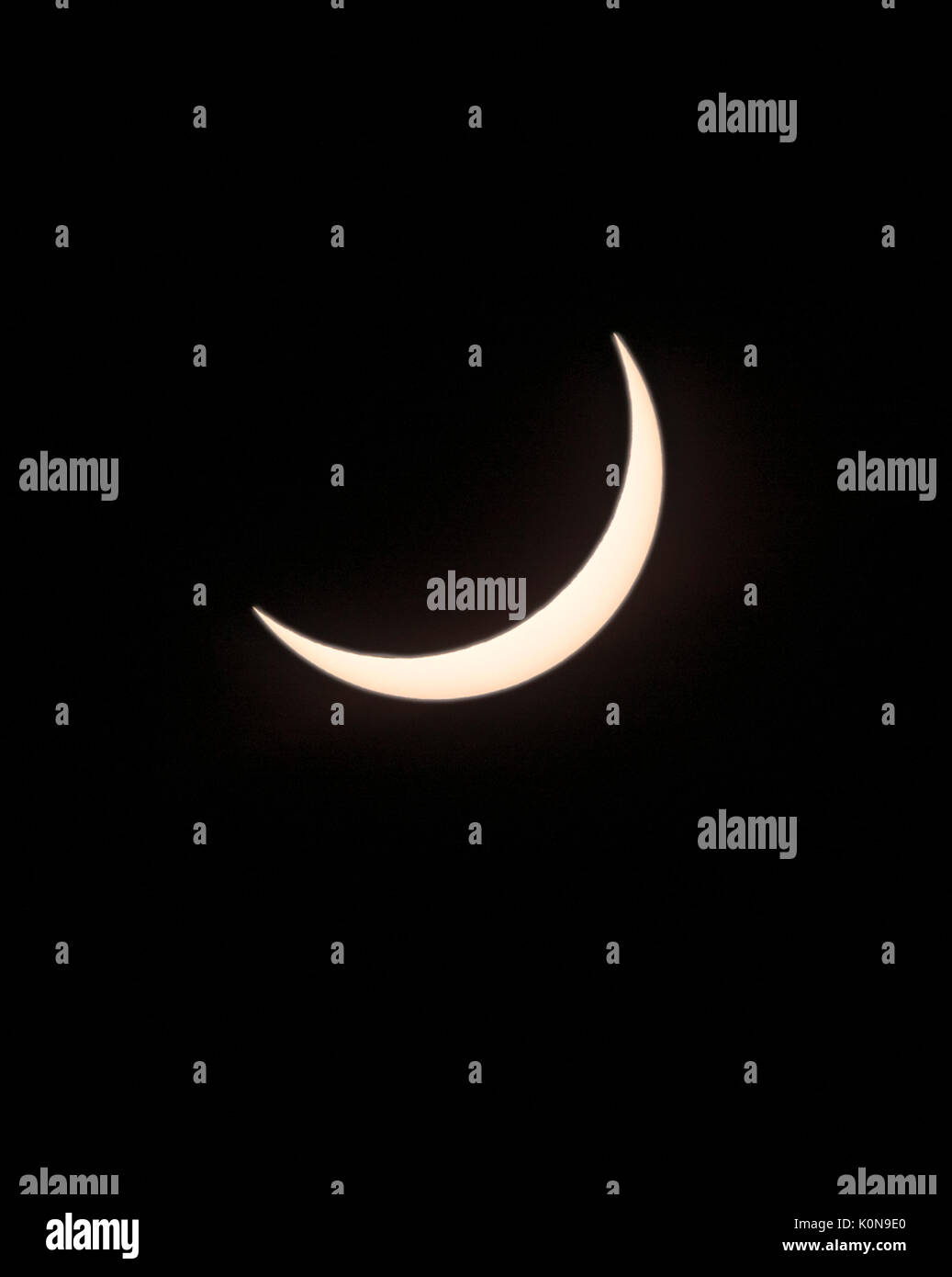 Photograph of the midday solar eclipse; the moon between earth & the ...