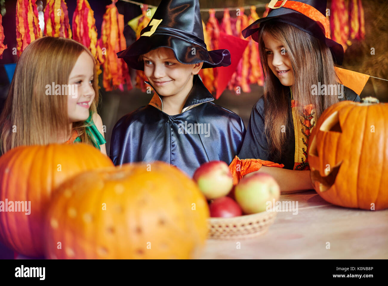 Children carving pumpkin jack halloween hi-res stock photography and ...