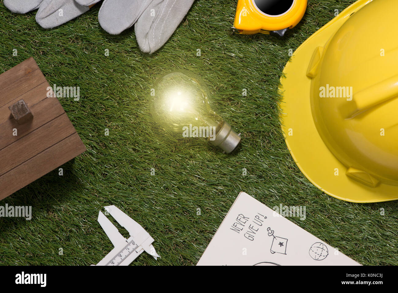 Green building and energy saving concept: house projecj and work tools ...