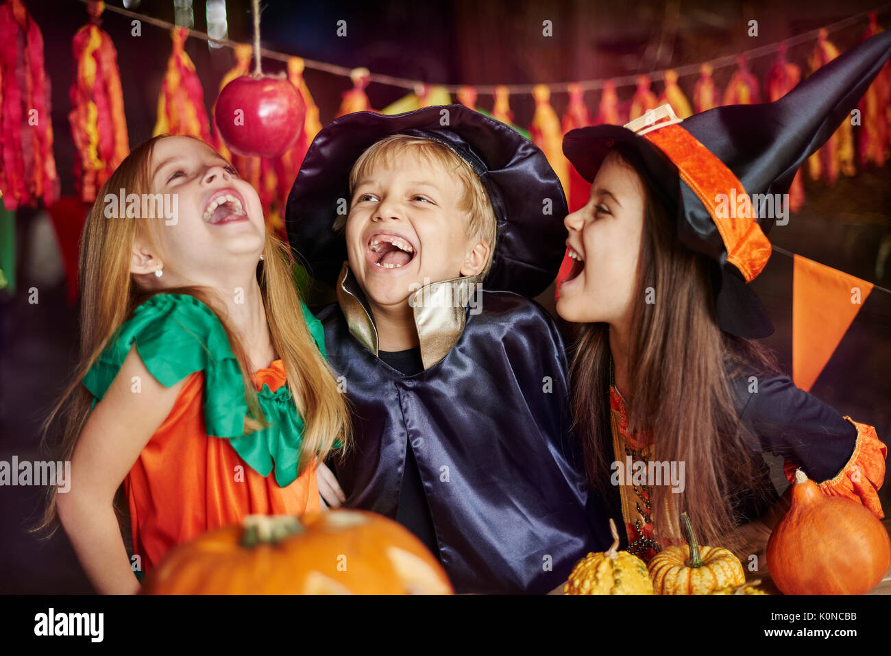 Boy catching apple hi-res stock photography and images - Alamy
