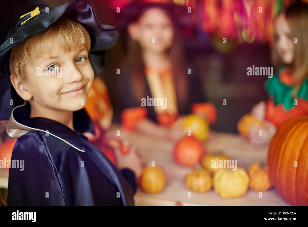 Little wizard and his helpers Stock Photo - Alamy