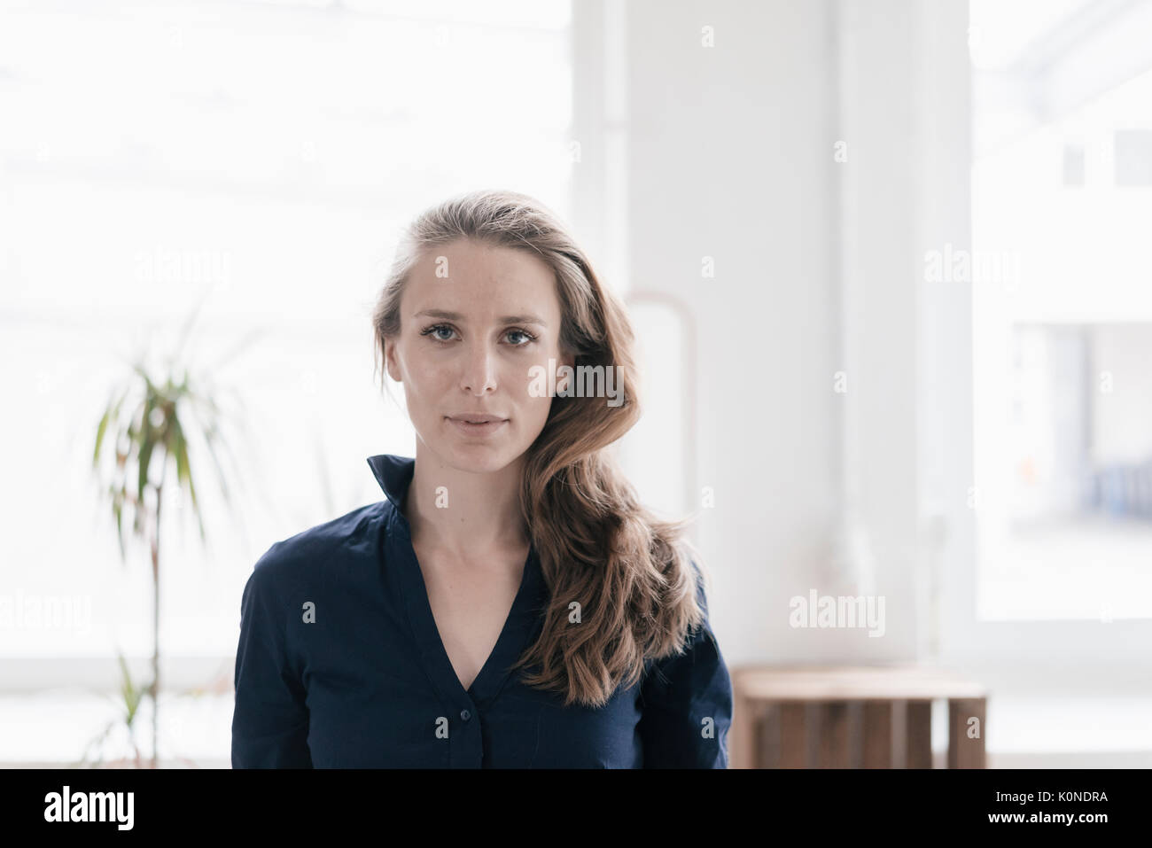 Portrait of serious woman Stock Photo - Alamy