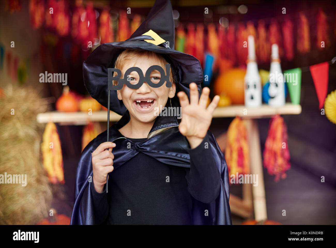 Little wizard trying to be scary Stock Photo - Alamy