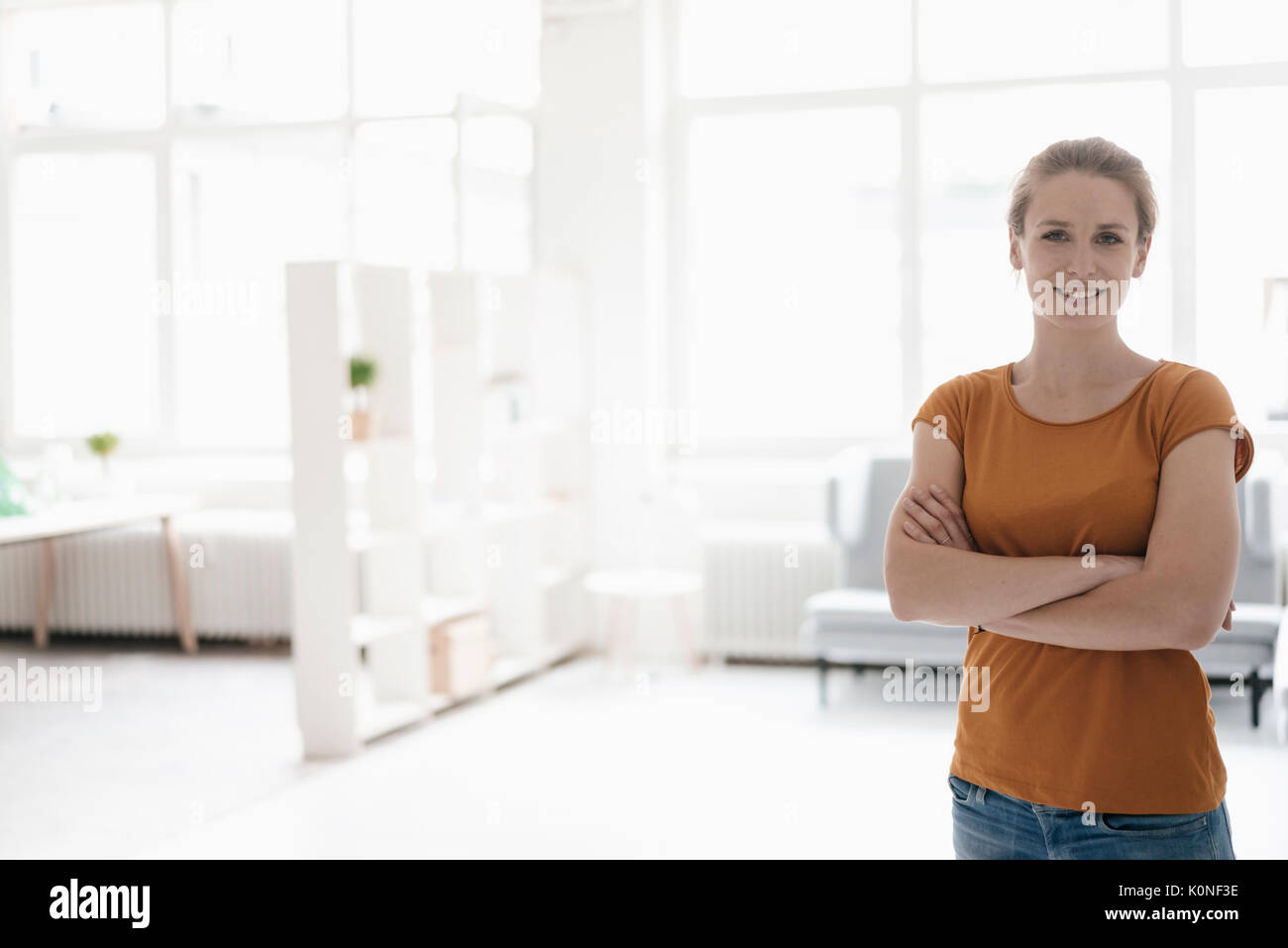 Portrait of woman in a loft Stock Photo - Alamy