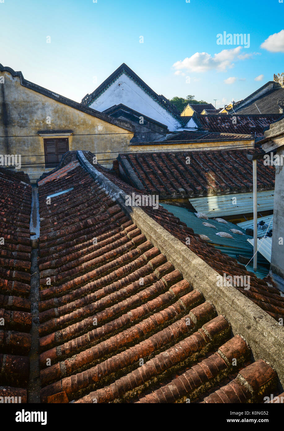 Roof top of old brick houses in Hoi An ancient town, Vietnam. Hoi an is ...