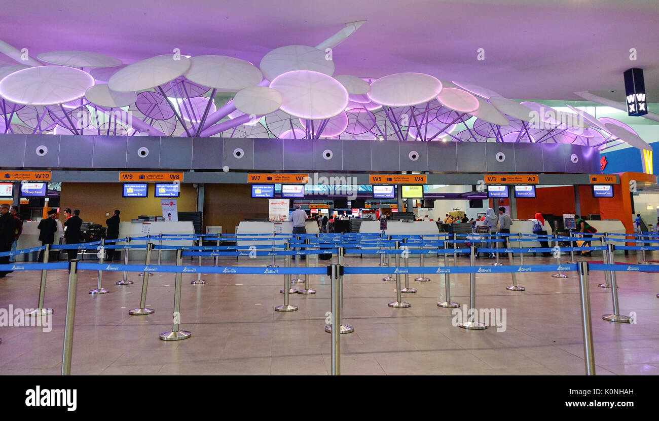 Kuala Lumpur, Malaysia - Dec 16, 2015. Check-in counters at Departure ...
