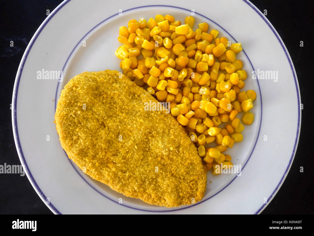 CHICKEN SCHNITZEL WITH SWEETCORN Stock Photo - Alamy