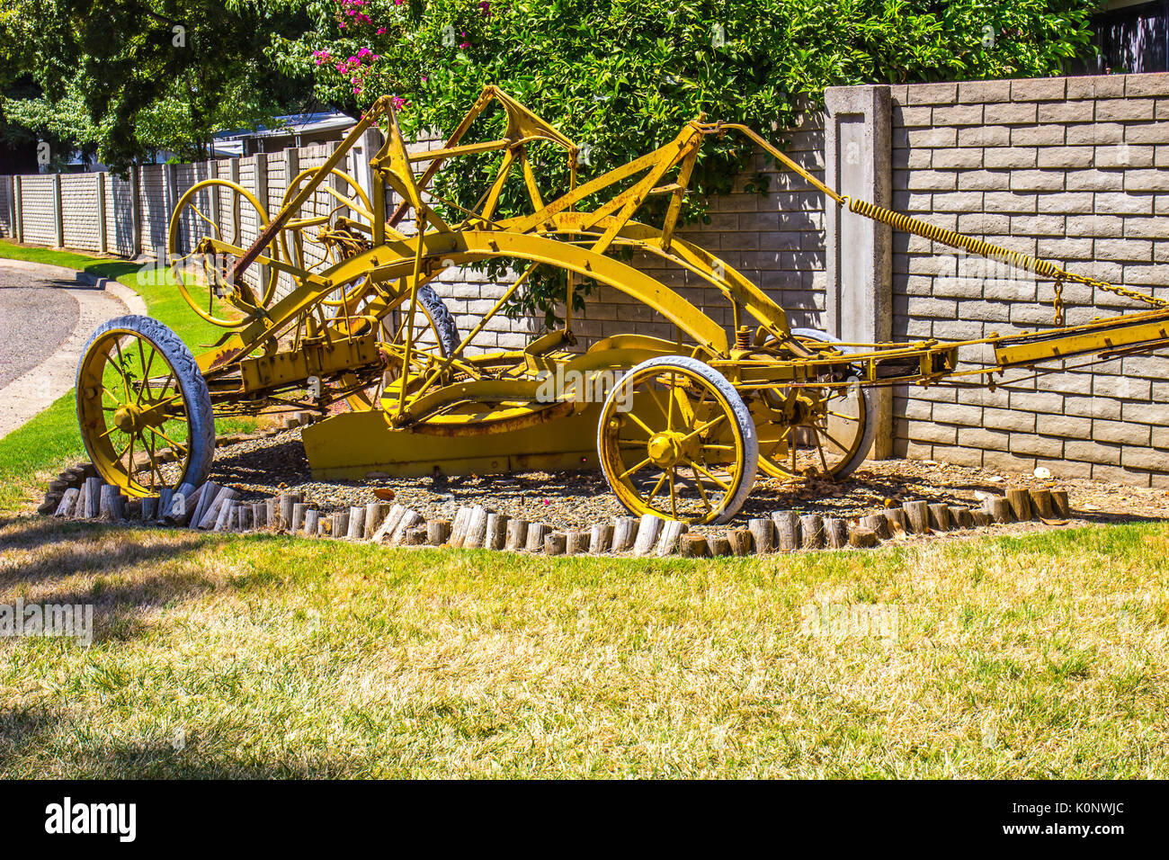Vintage Yellow Farm Plow On Display Stock Photo - Alamy