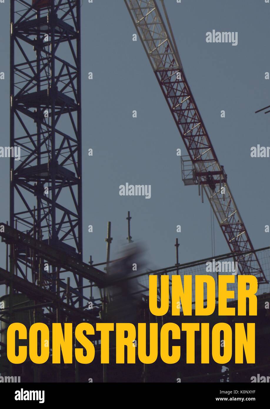 Digital composite of Under construction text against construction photo ...