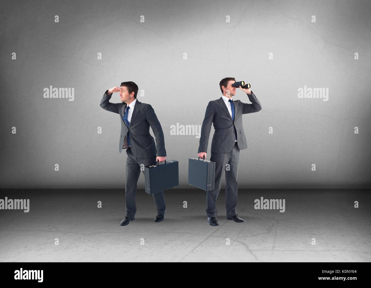 Digital composite of Businessman looking in opposite directions Stock ...