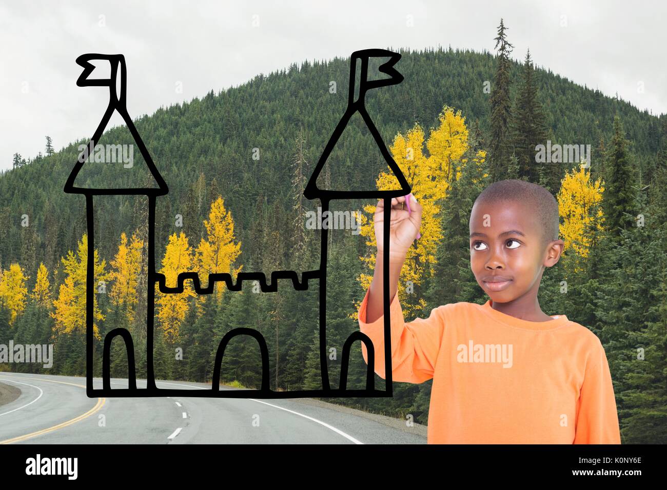 Digital composite of Boy drawing a castle on the road Stock Photo - Alamy