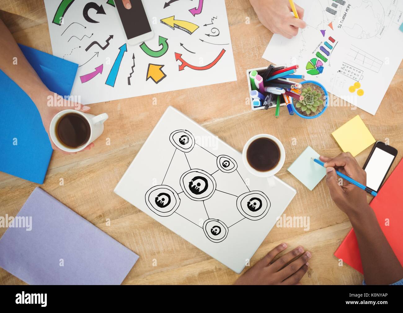 Digital composite of Table top meeting with web graphics Stock Photo ...