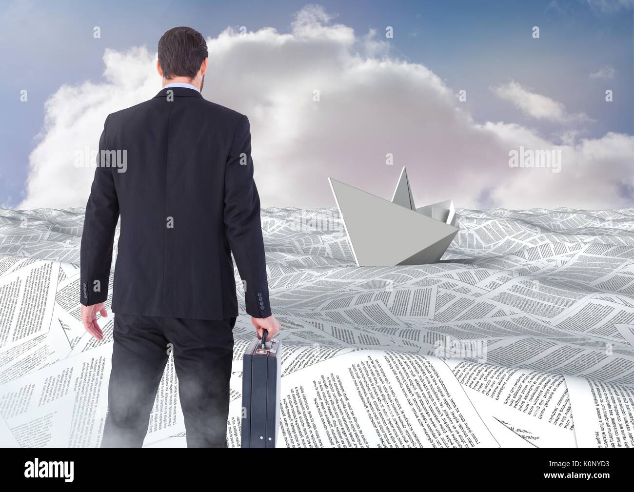 Digital composite of Businessman holding briefcase in sea of documents ...