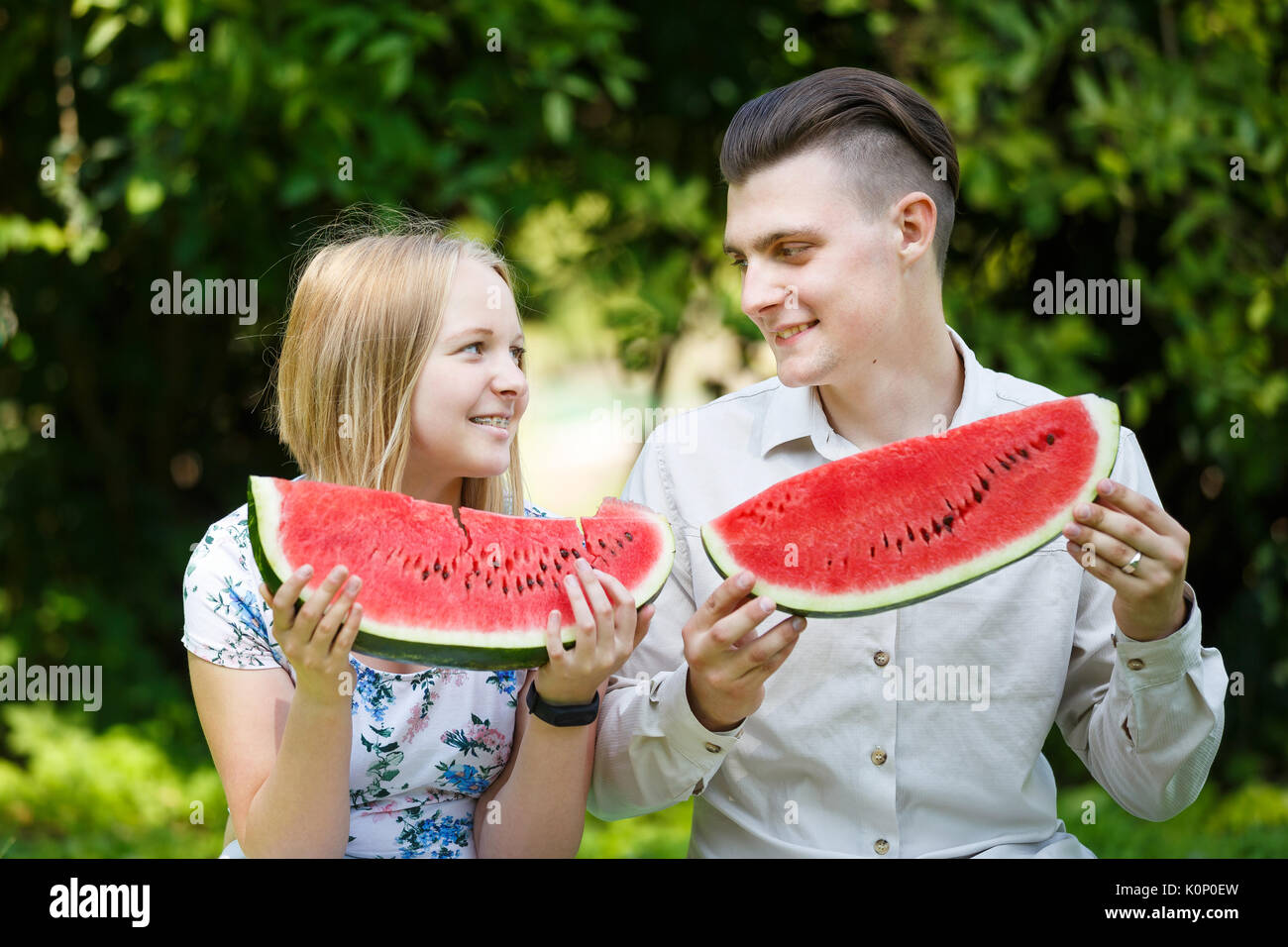 Closeup woman eating watermelon outdoors hi-res stock photography and ...