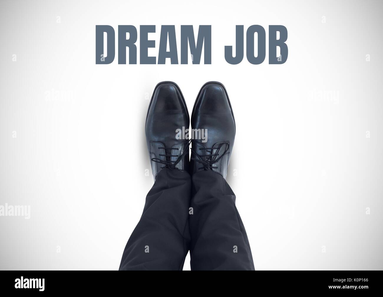 Digital composite of Dream job text and Black shoes on feet with white ...