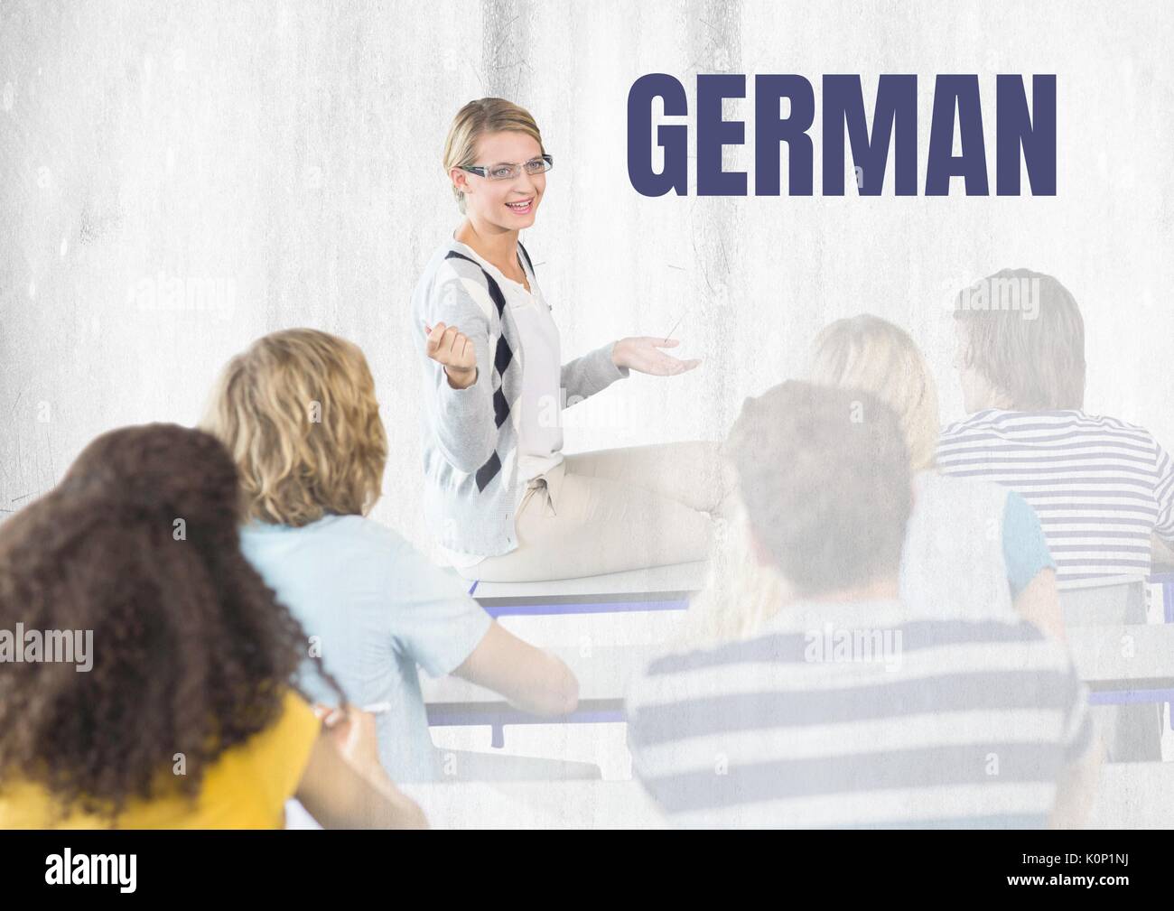 Digital composite of German text and teacher with class Stock Photo - Alamy