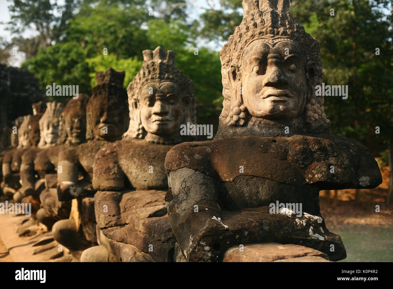 Guardian statues of Angkor Thom south door, Siam Reap, Cambodia Stock ...