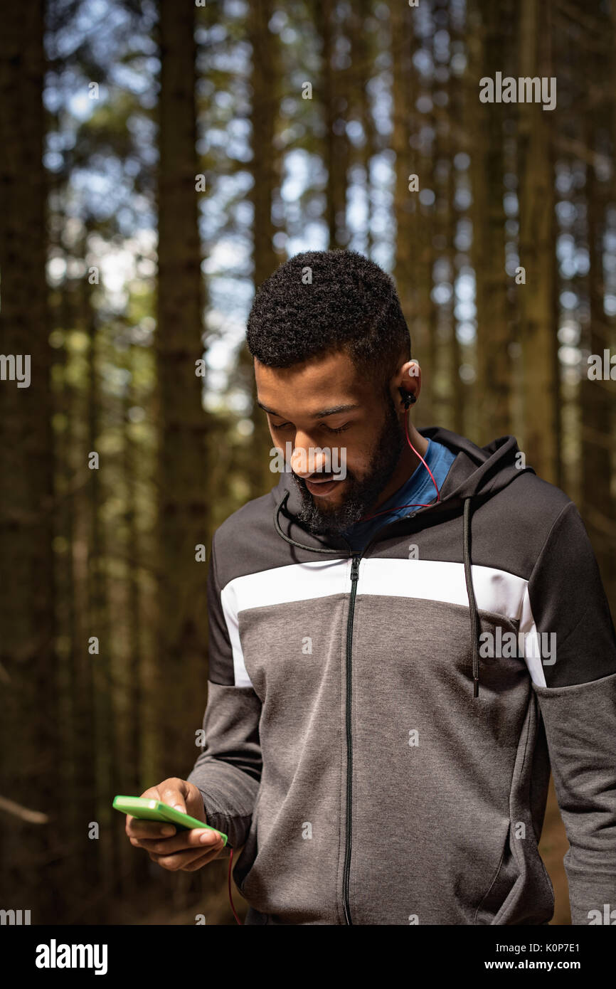 Man woodland cellphone hi-res stock photography and images - Alamy