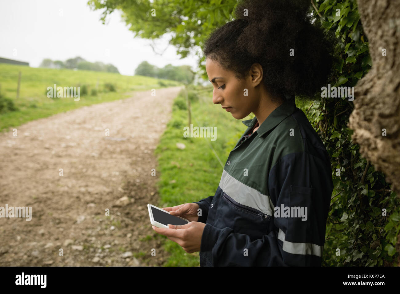 Female farmer holding digital hi-res stock photography and images - Alamy