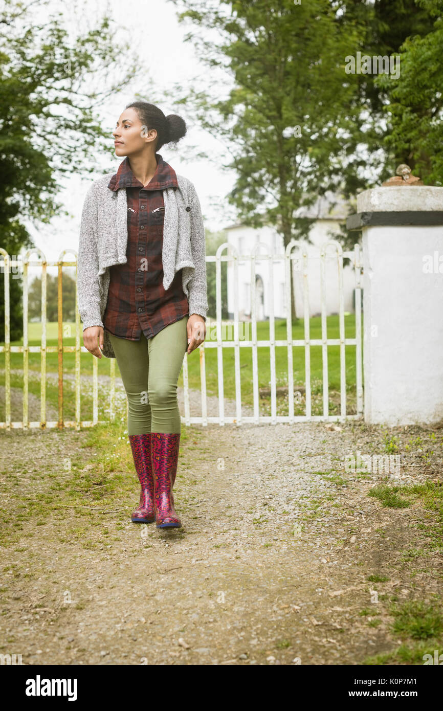 Beautiful female farmer walking hi-res stock photography and images - Alamy