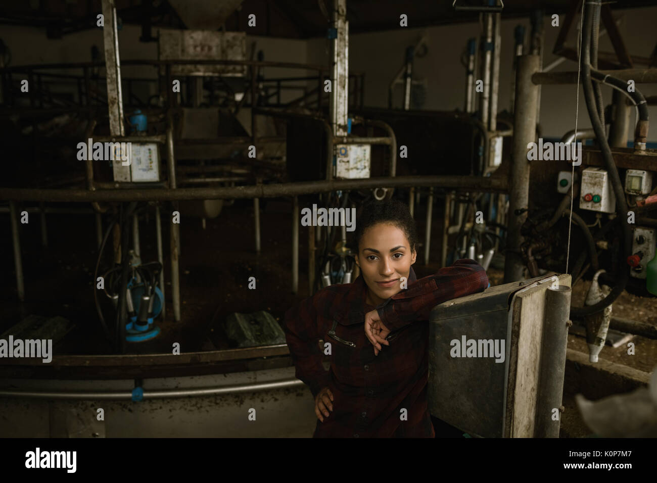 Portrait of confident woman standing in barn Stock Photo - Alamy