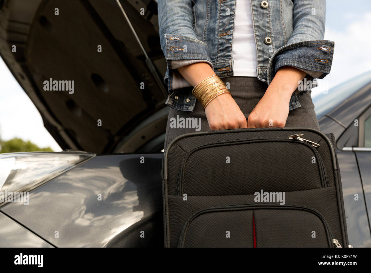 Woman leave suitcase hi-res stock photography and images - Alamy