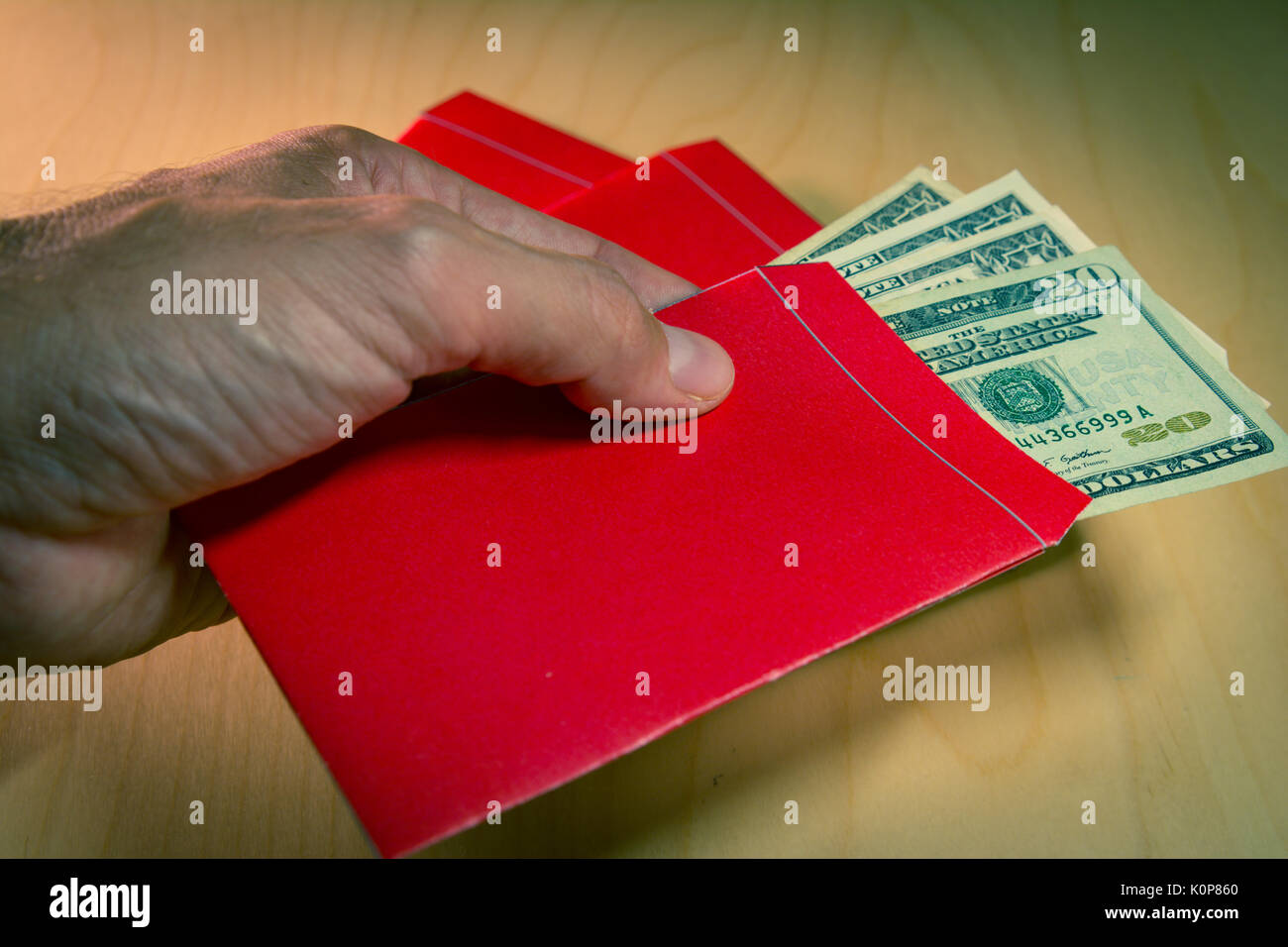 The red envelope or hong bao is used for giving money during Chinese ...