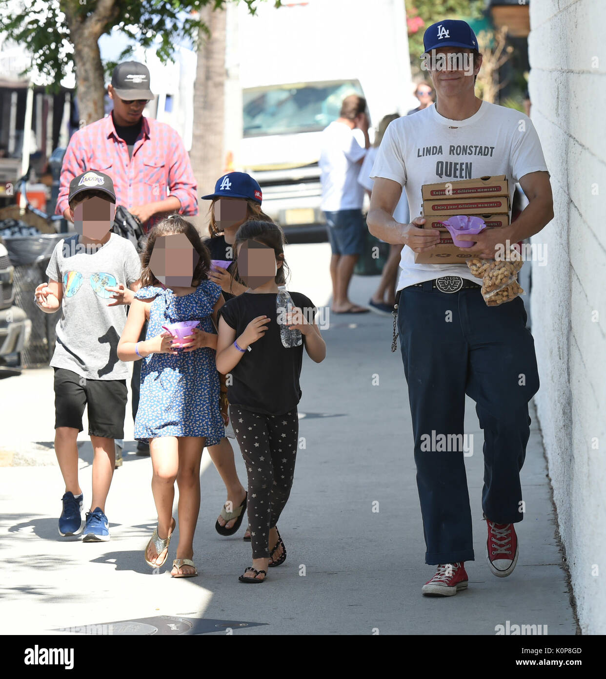 Johnny Knoxville buys pizza and snow cones for his kids Rocko Clapp and ...
