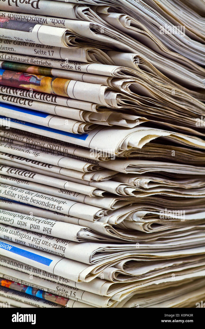 Image of a stack of newspaper Stock Photo - Alamy