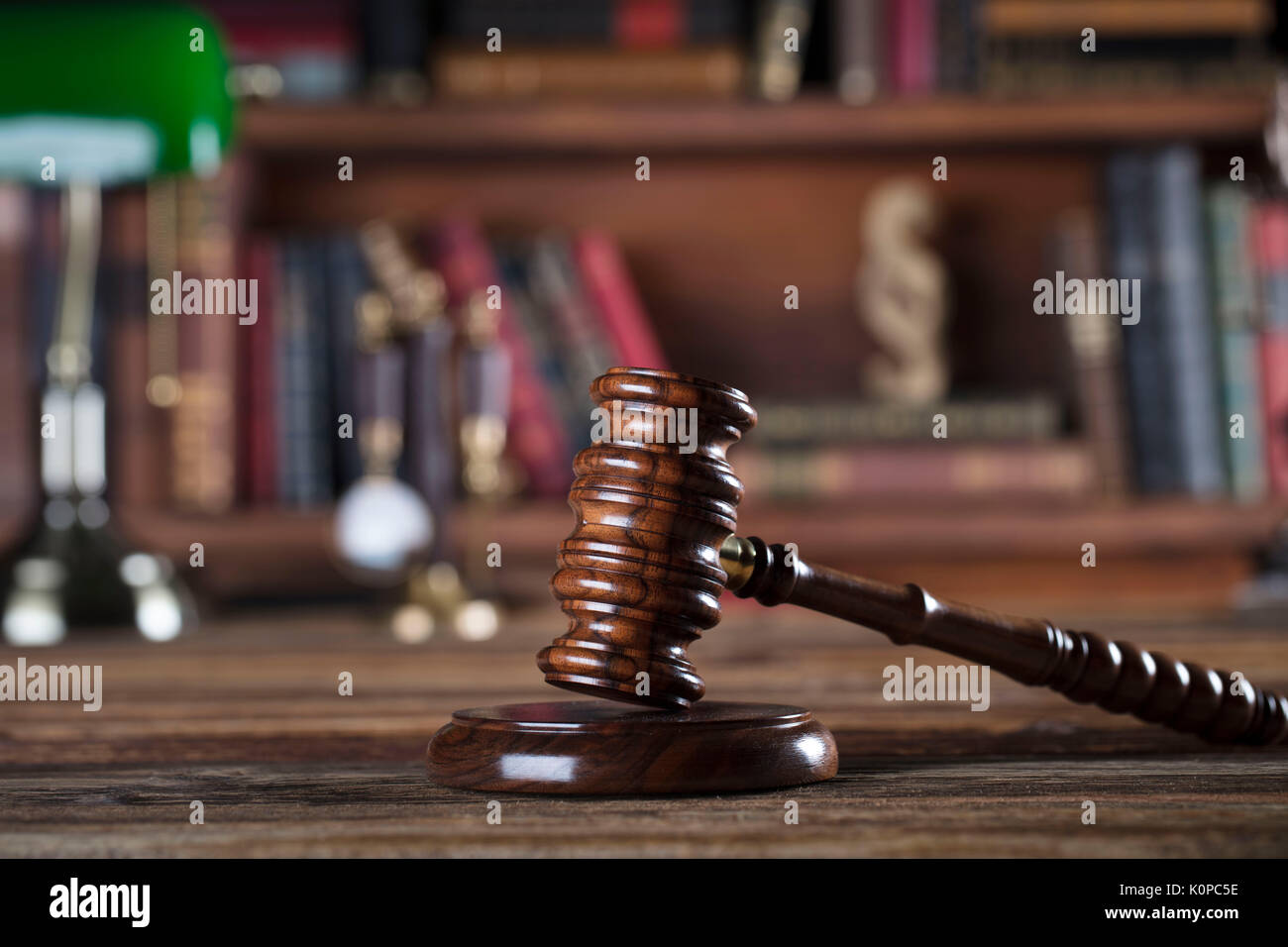Gavel of the jugde and scale of justice in the lawyer library Stock ...