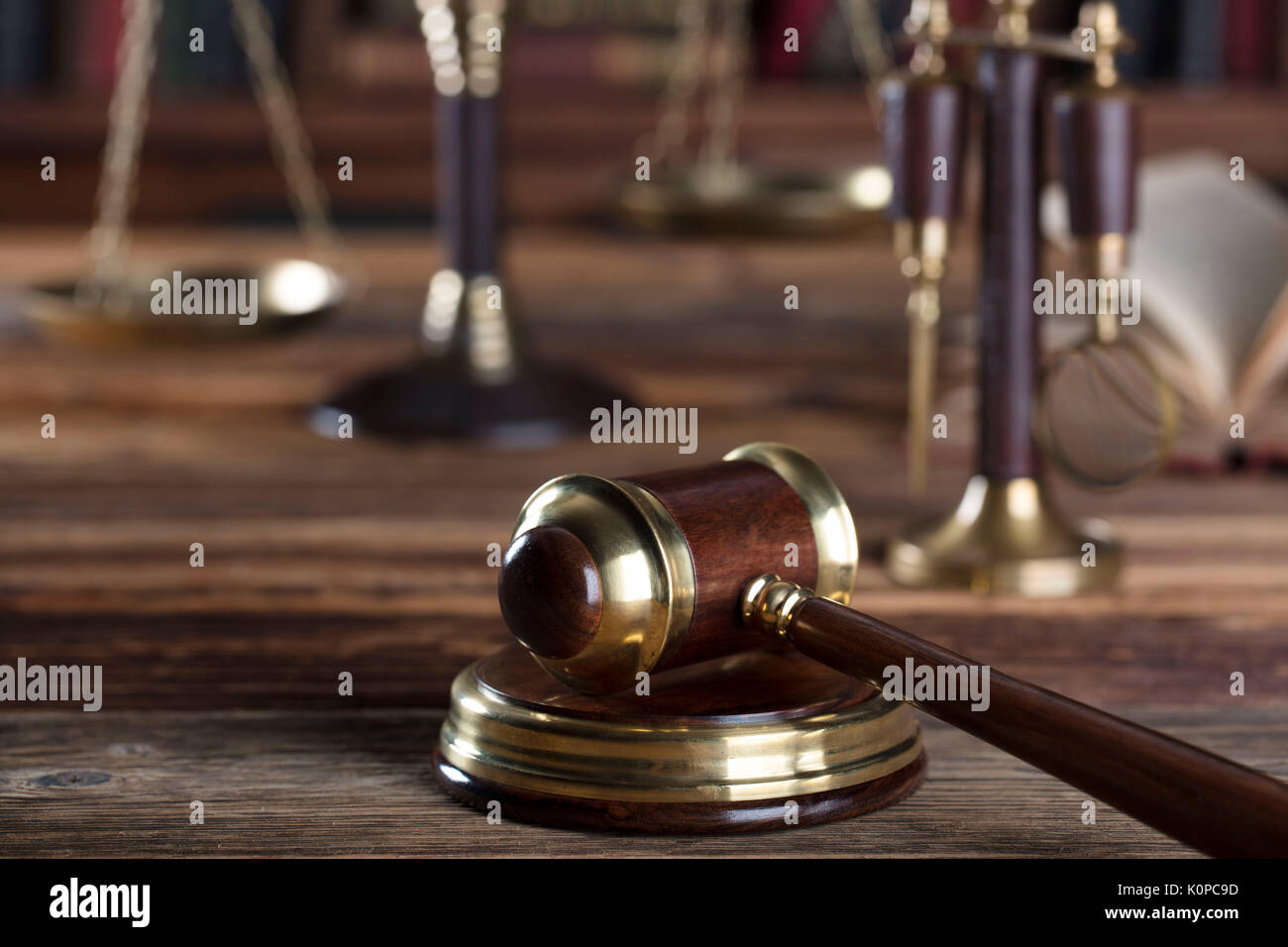 Gavel of the jugde and scale of justice in the lawyer library Stock ...