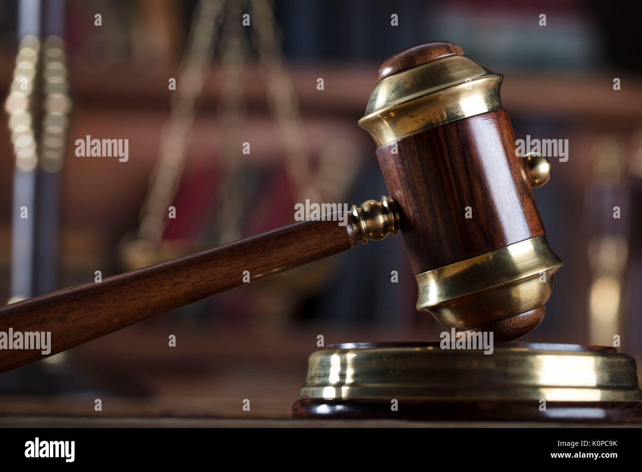 Gavel of the jugde and scale of justice in the lawyer library Stock ...
