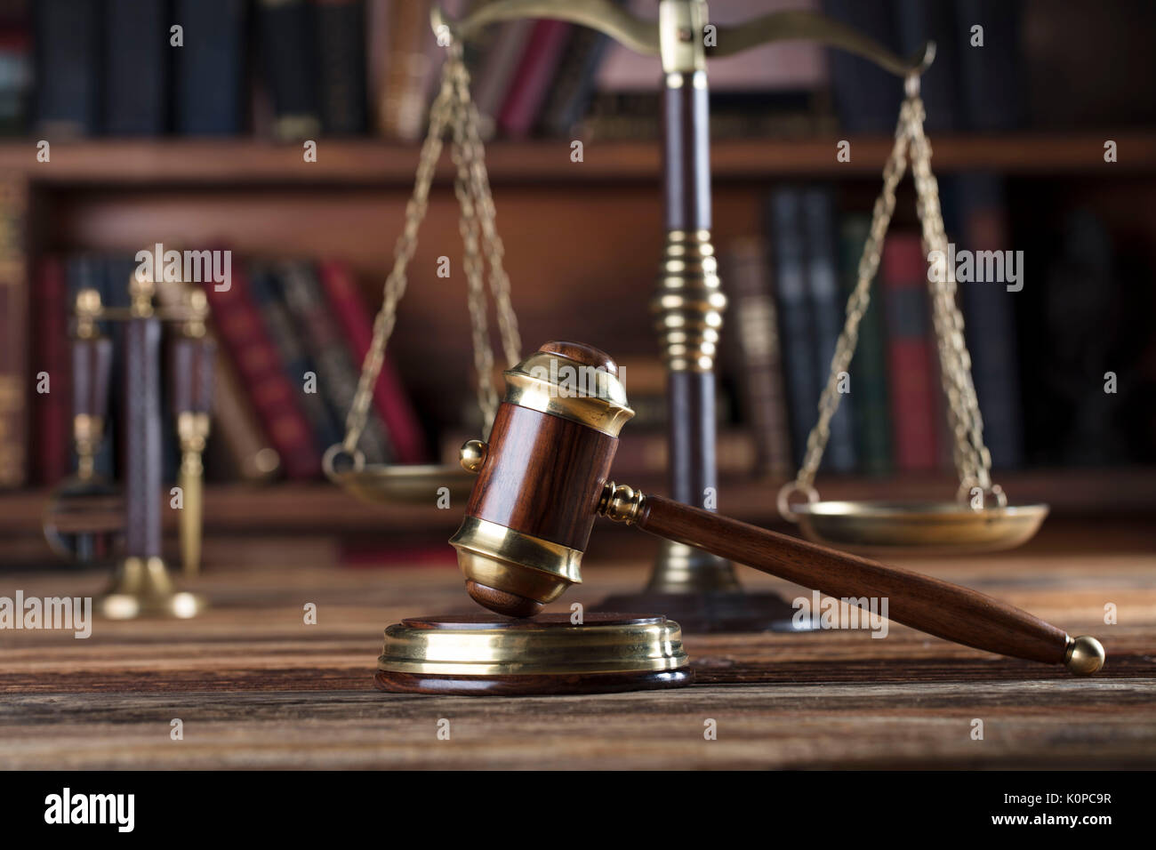 Gavel of the jugde and scale of justice in the lawyer library Stock ...