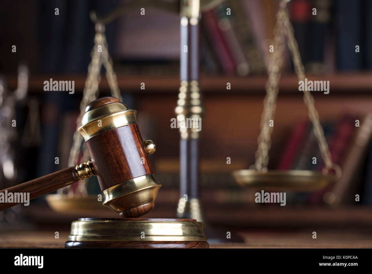 Gavel of the jugde and scale of justice in the lawyer library Stock ...