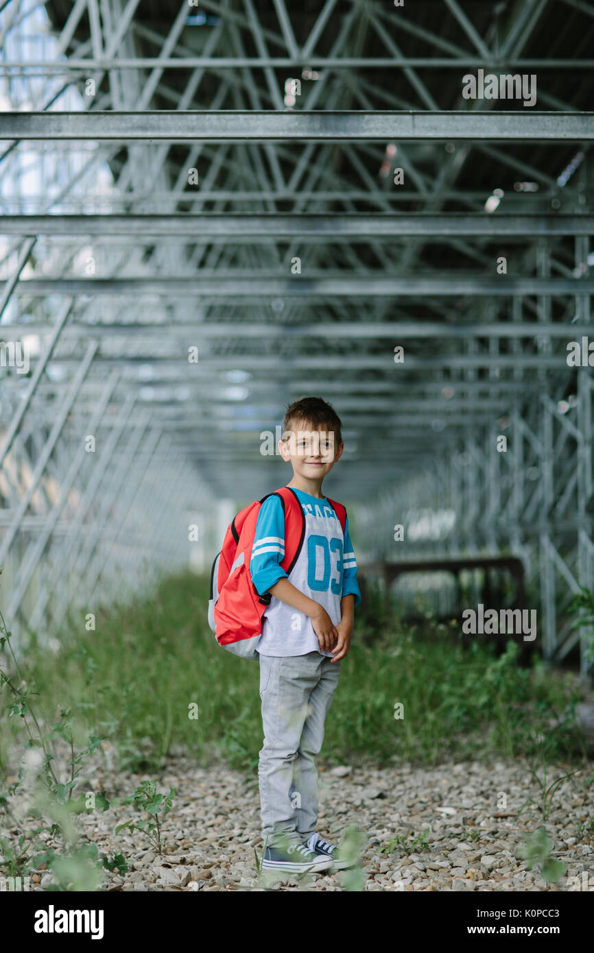 Child walking alone to school Stock Photo - Alamy