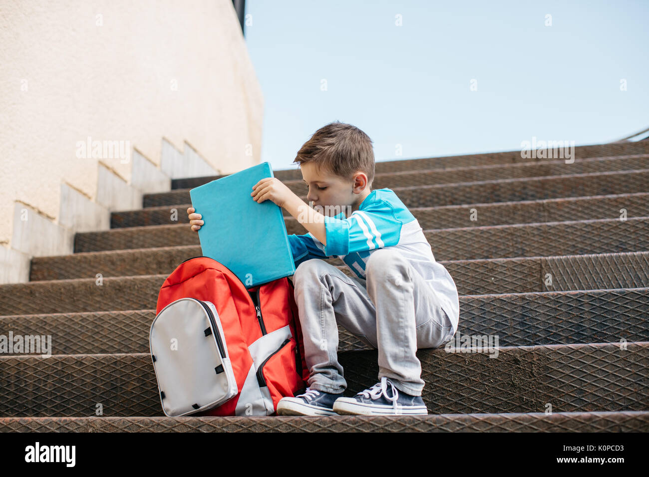 Little student getting ready for a lesson Stock Photo - Alamy