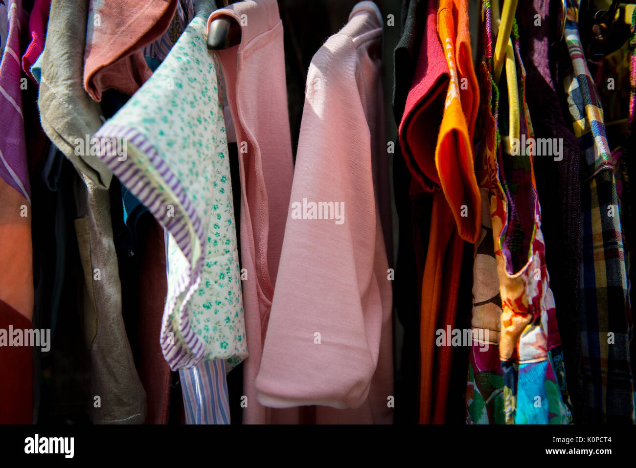colorful clothes hanging Stock Photo - Alamy