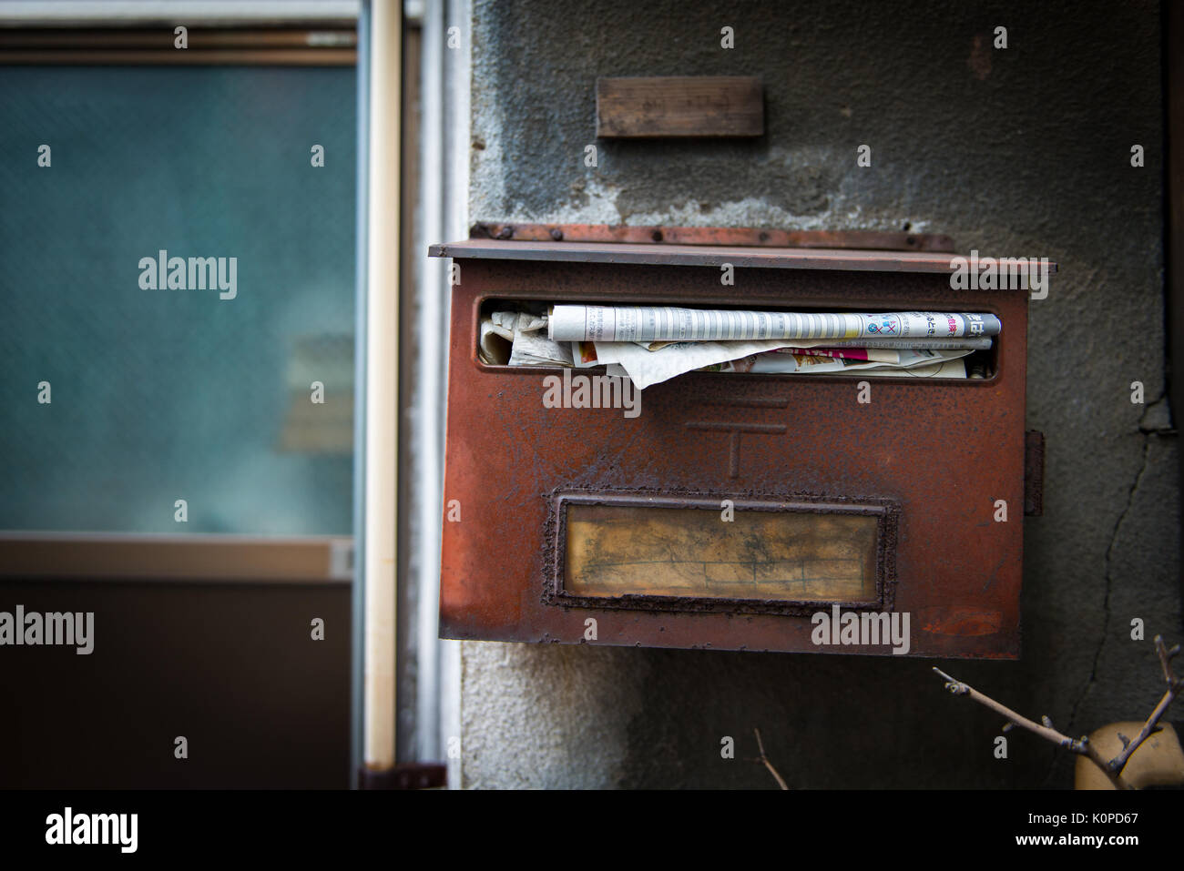 Mailbox full of mails in Tokyo Stock Photo - Alamy